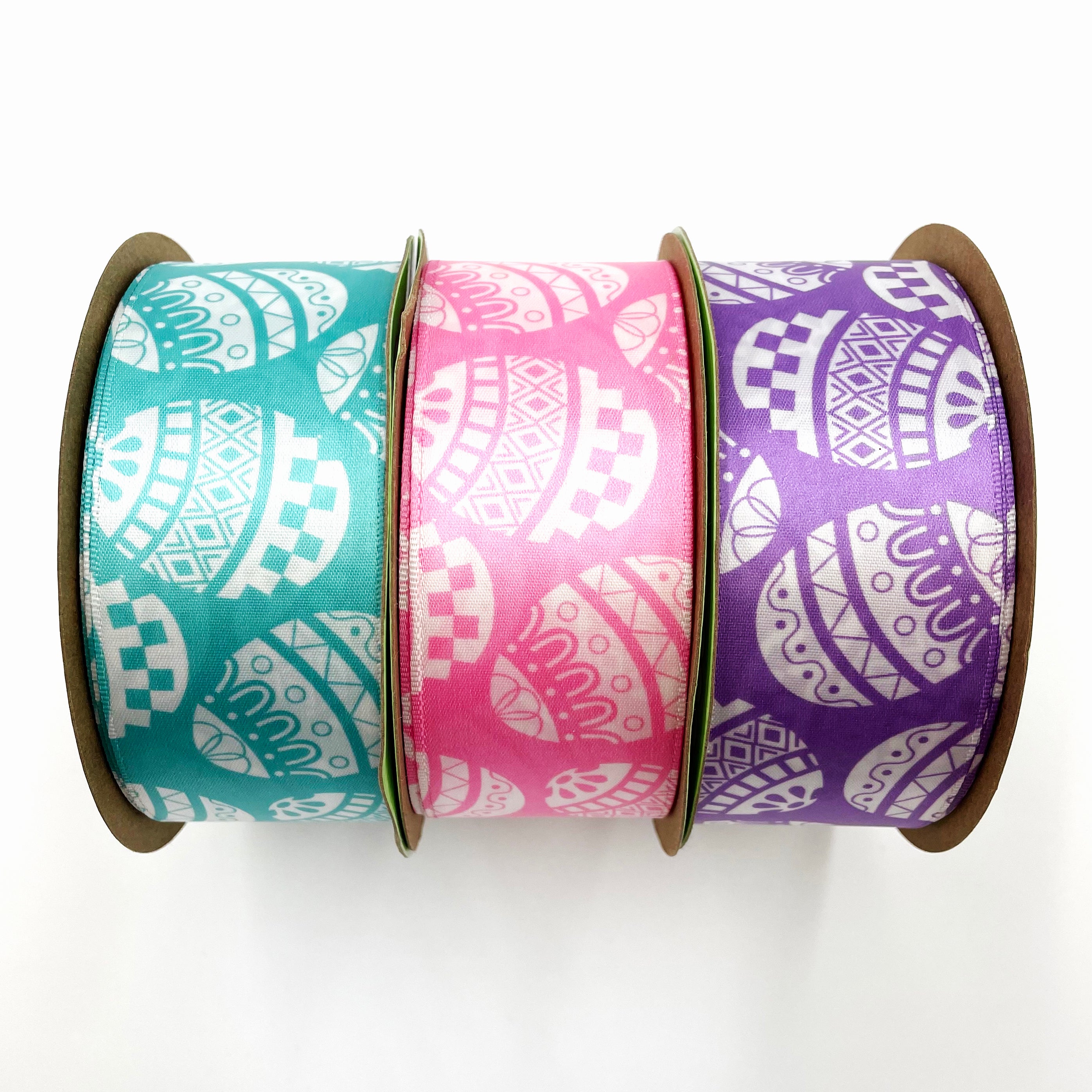 Easter egg ribbon stenciled in white on a lavender background printed ...