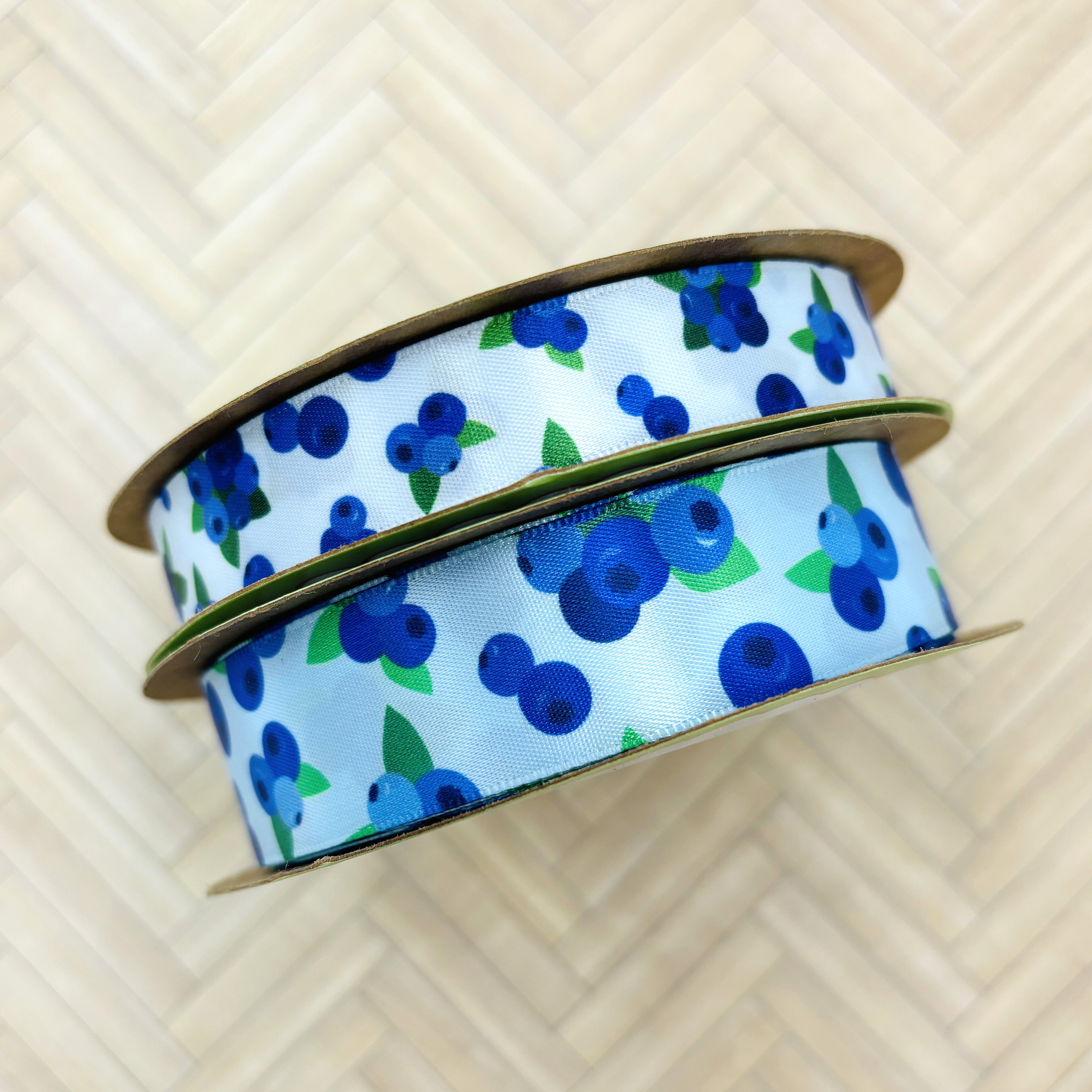 Blueberries on 5/8" light blue/gray single face satin ribbon, 10 yards