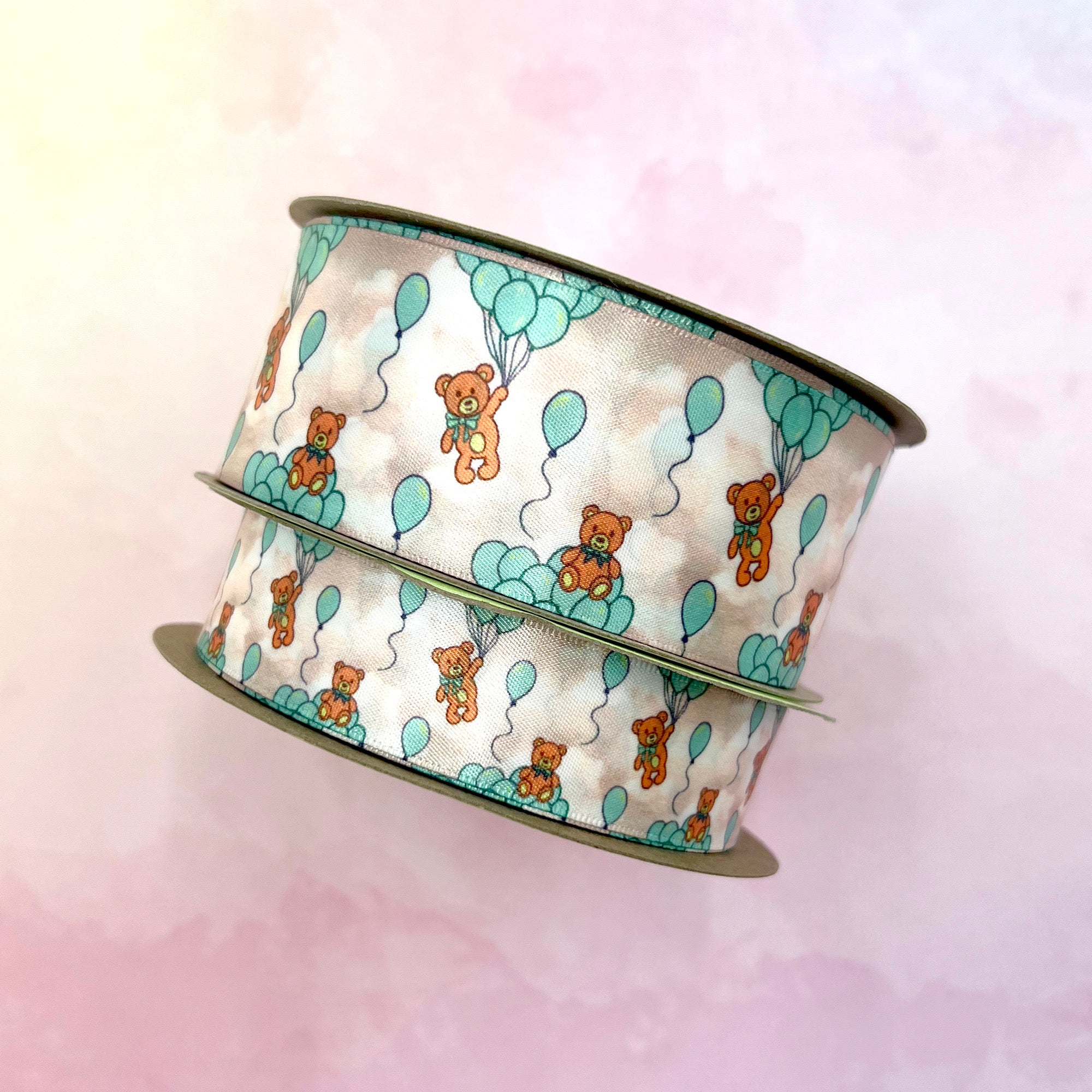 Teddy Bear Ribbon Teddy Bears with balloons floating on a tan cloud ba